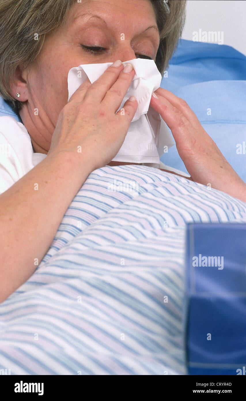 ELDERLY PERSON WITH RHINITIS Stock Photo - Alamy