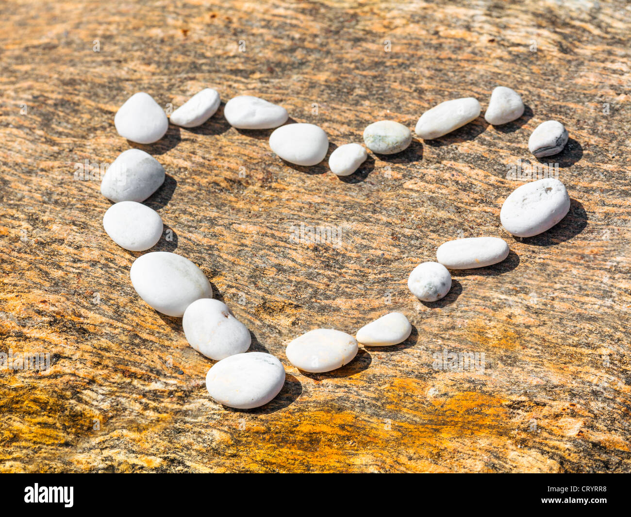 Heart shape from the pebble Stock Photo - Alamy