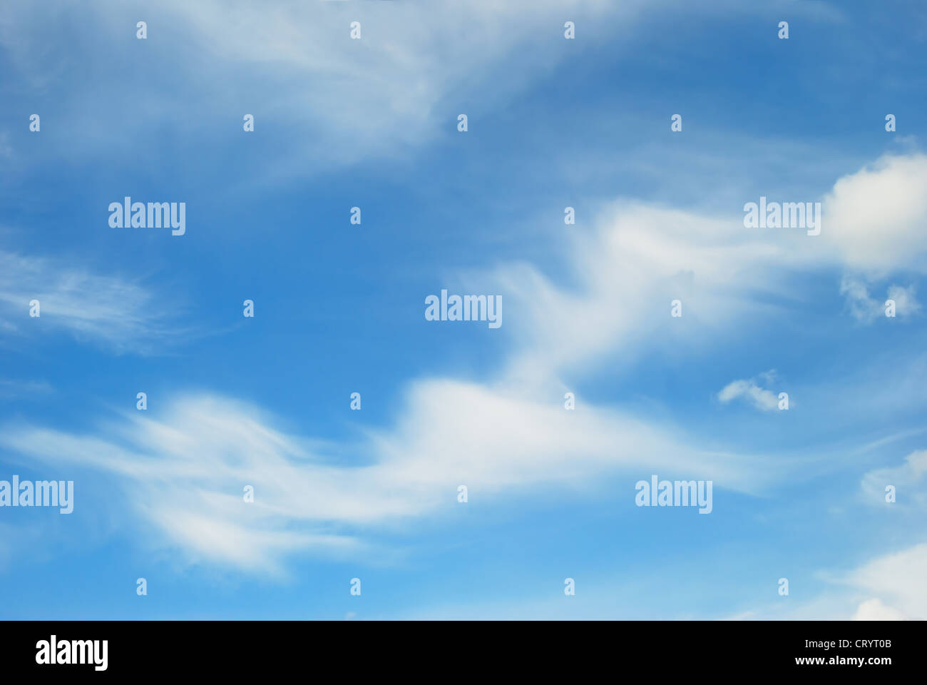 Blue sky with clouds in the shape of a flying bird Stock Photo - Alamy