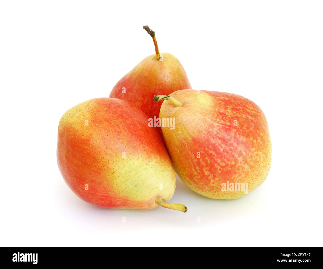 Three red pears isolated on white background Stock Photo - Alamy