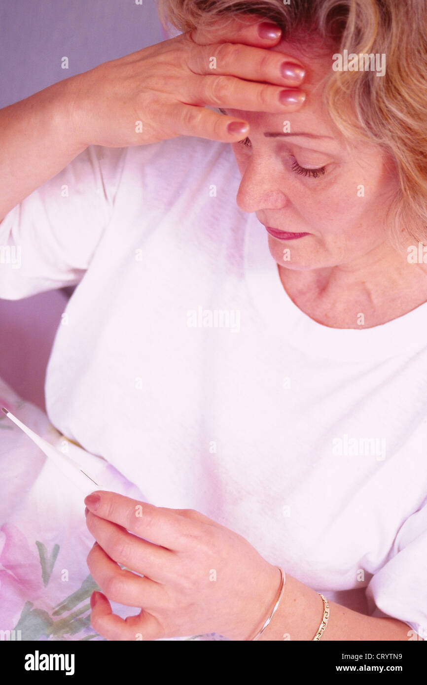 FEVER IN AN ELDERLY PERSON Stock Photo - Alamy