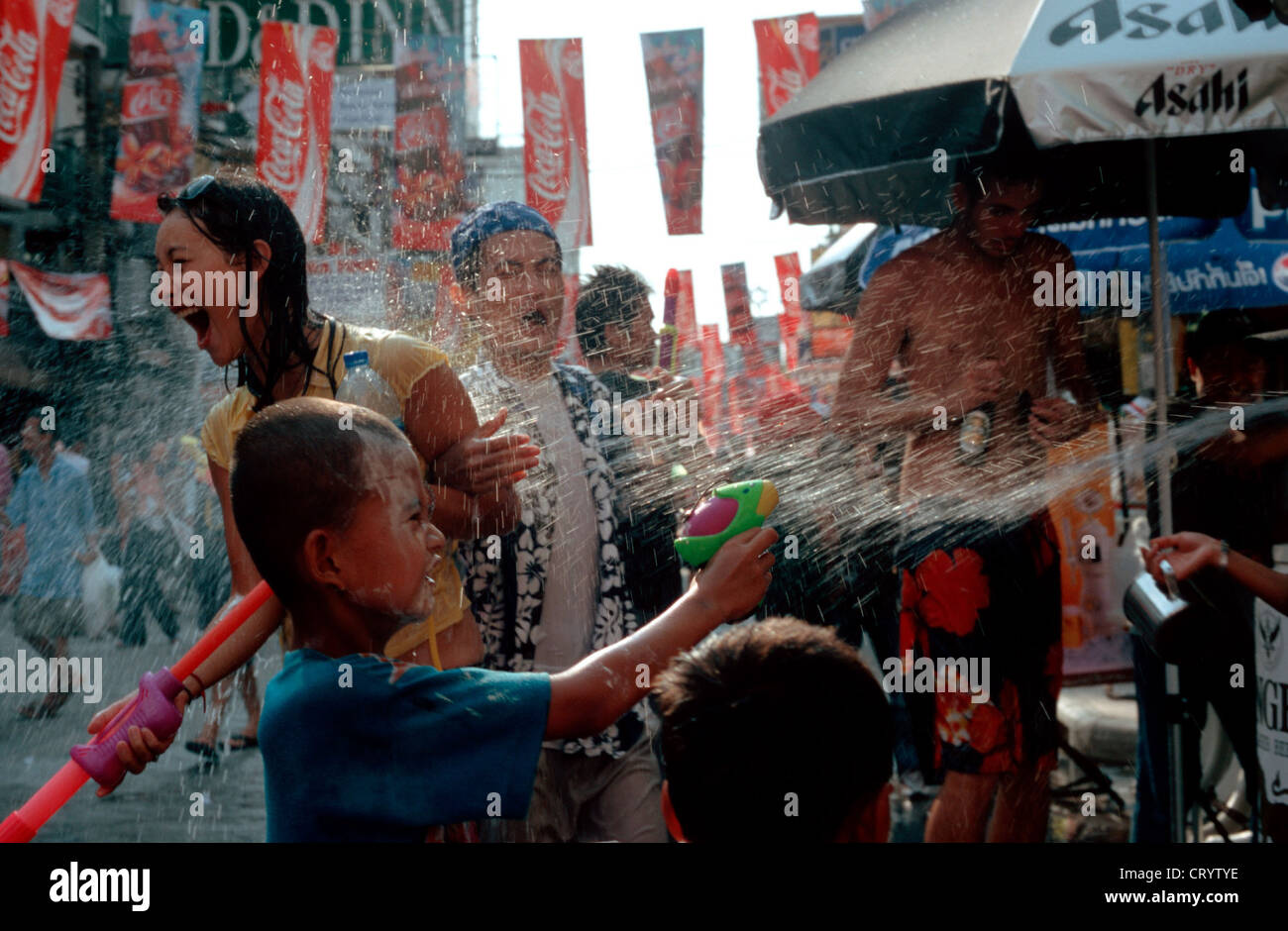 Young people are splashed with water Stock Photo - Alamy