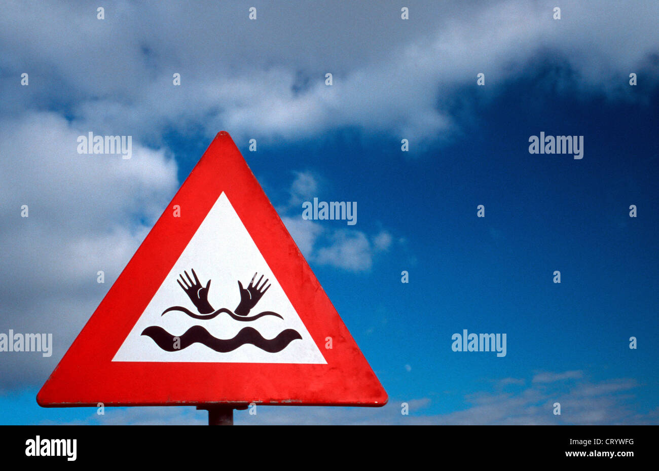 Caution land under water - Warning Sign Stock Photo - Alamy
