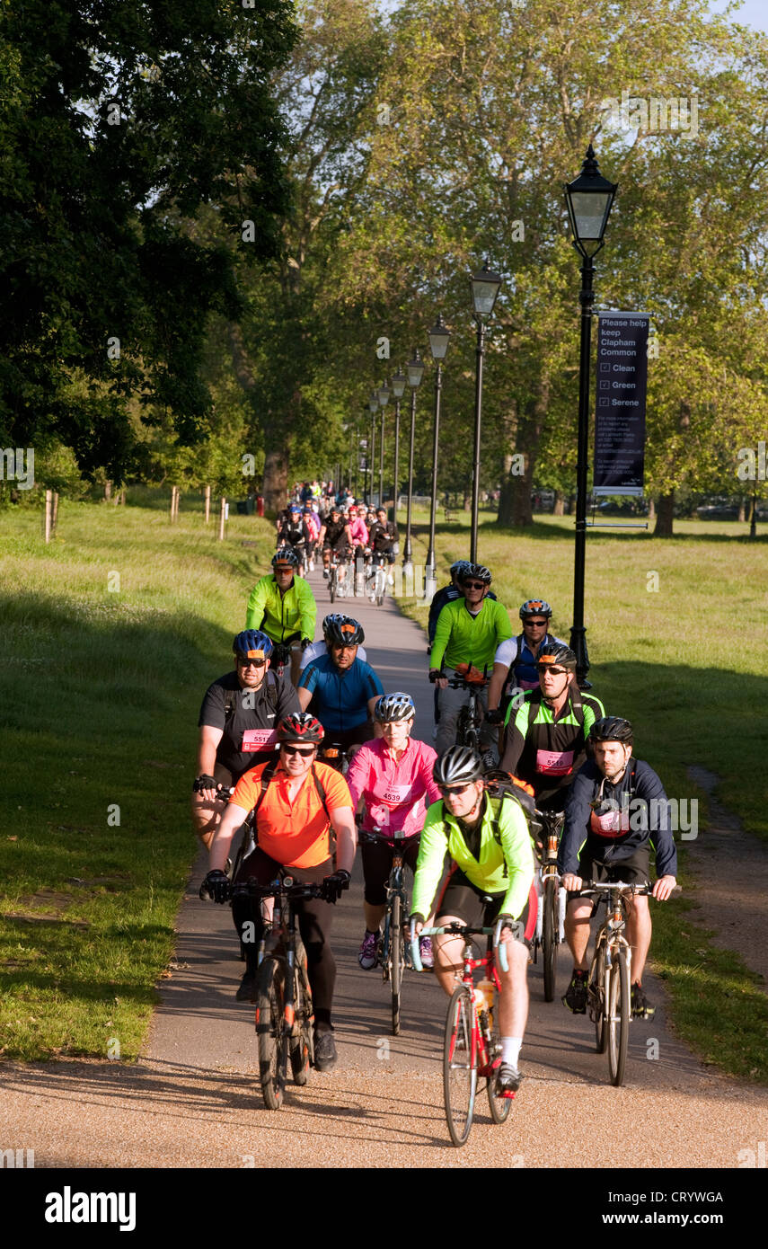 Bike riders cycling in Clapham Common at the start of the London to ...