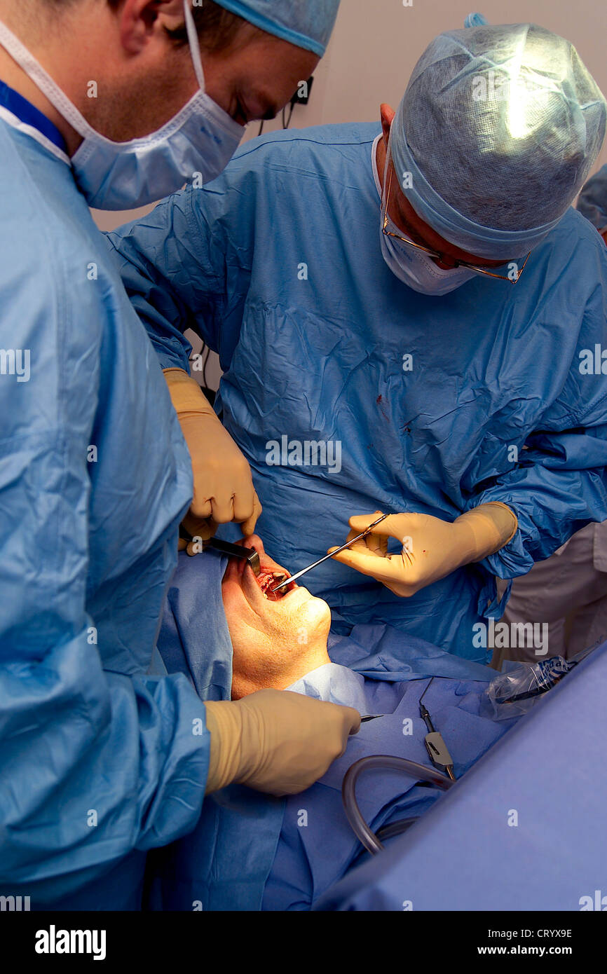 IMPLANT TOOTH SURGERY Stock Photo - Alamy