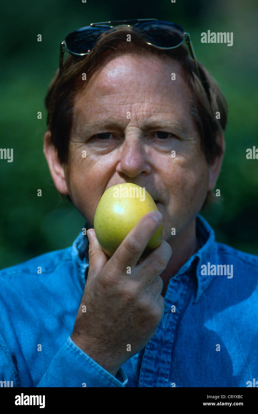 ELDERLY PERSON EATING FRUIT Stock Photo - Alamy