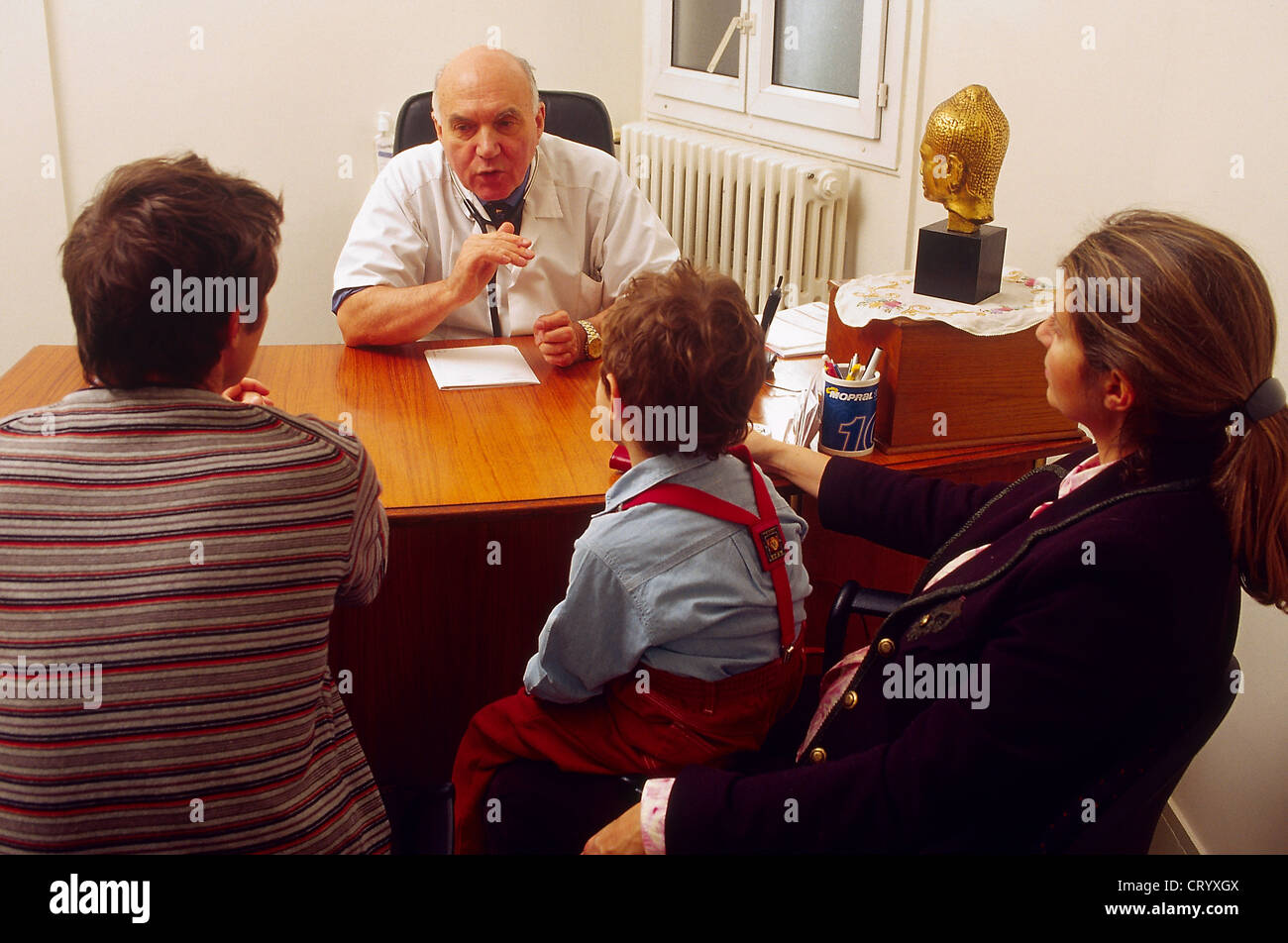 FAMILY IN CONSULTATION Stock Photo - Alamy