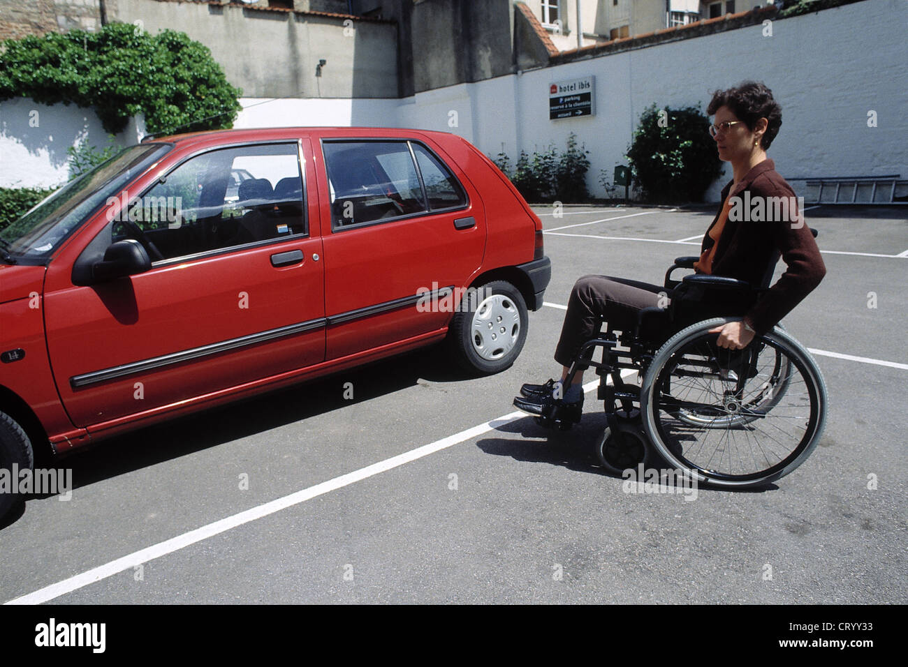 Woman wheelchair car automobile hi-res stock photography and images - Alamy