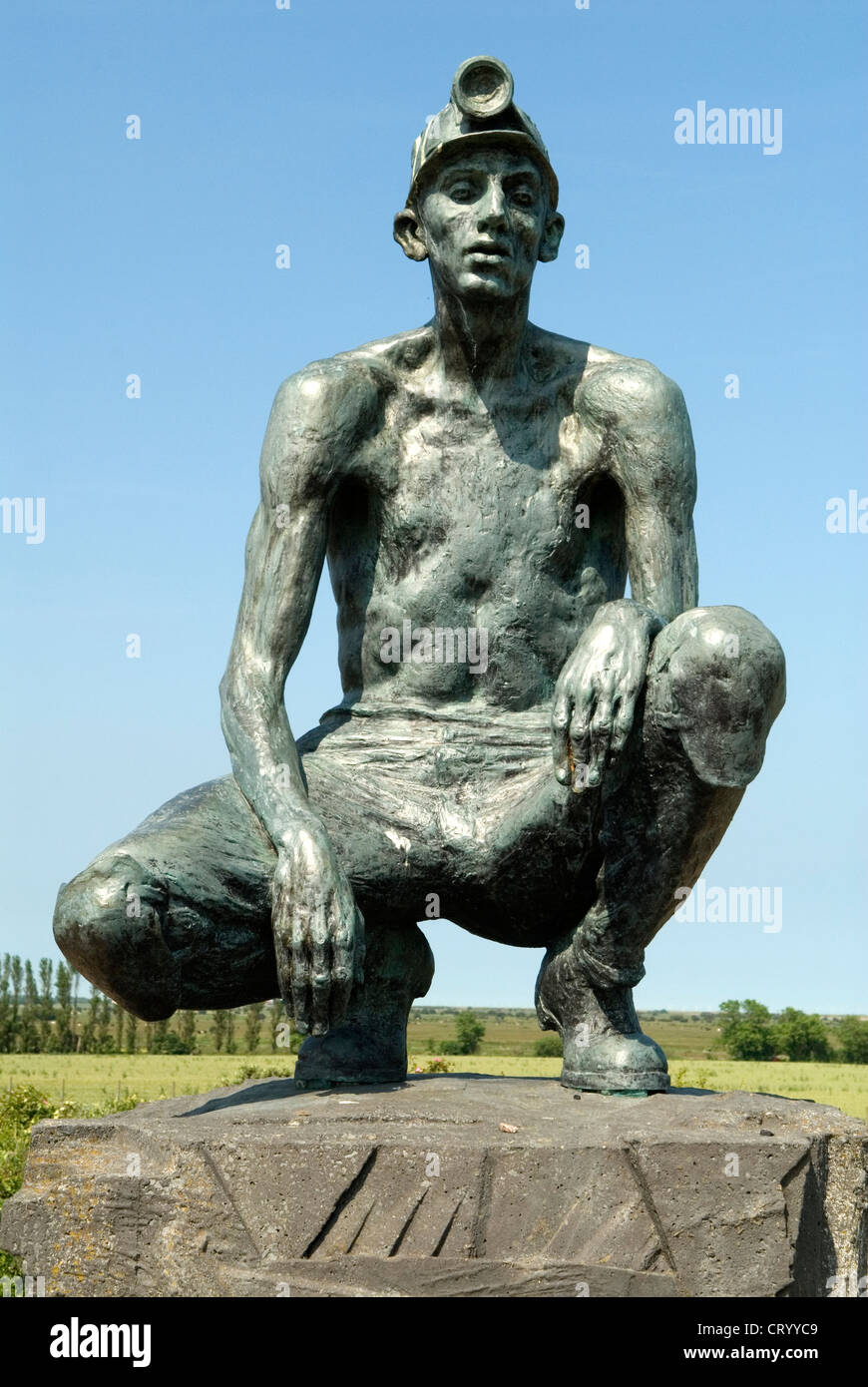 Betteshanger Kent UK. Statue of a Kent coal miner with miners hat and ...