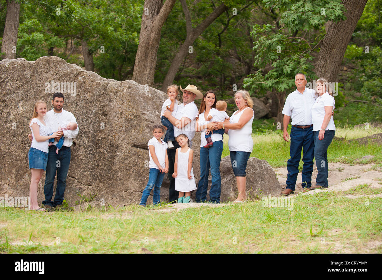 Outdoor family portrait of three generations Stock Photo - Alamy