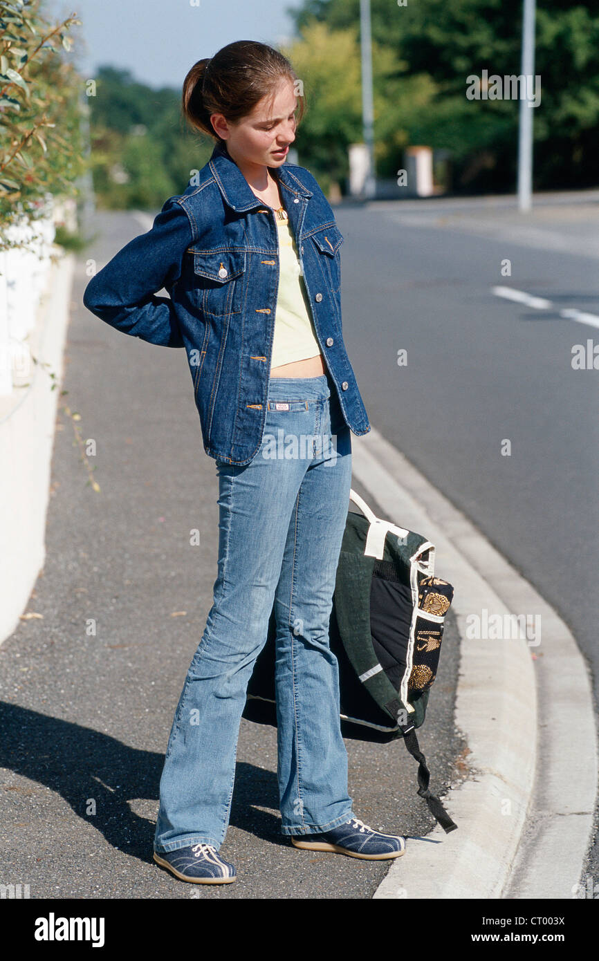 BACK PAIN IN AN ADOLESCENT Stock Photo - Alamy