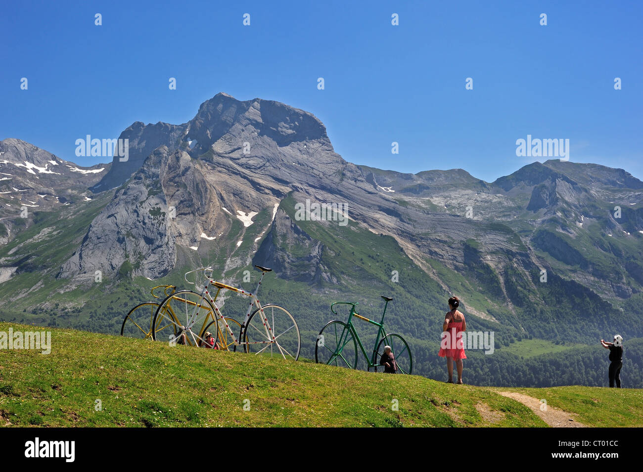 Tourists and giant bicycle sculptures in the mountains at the Col d ...