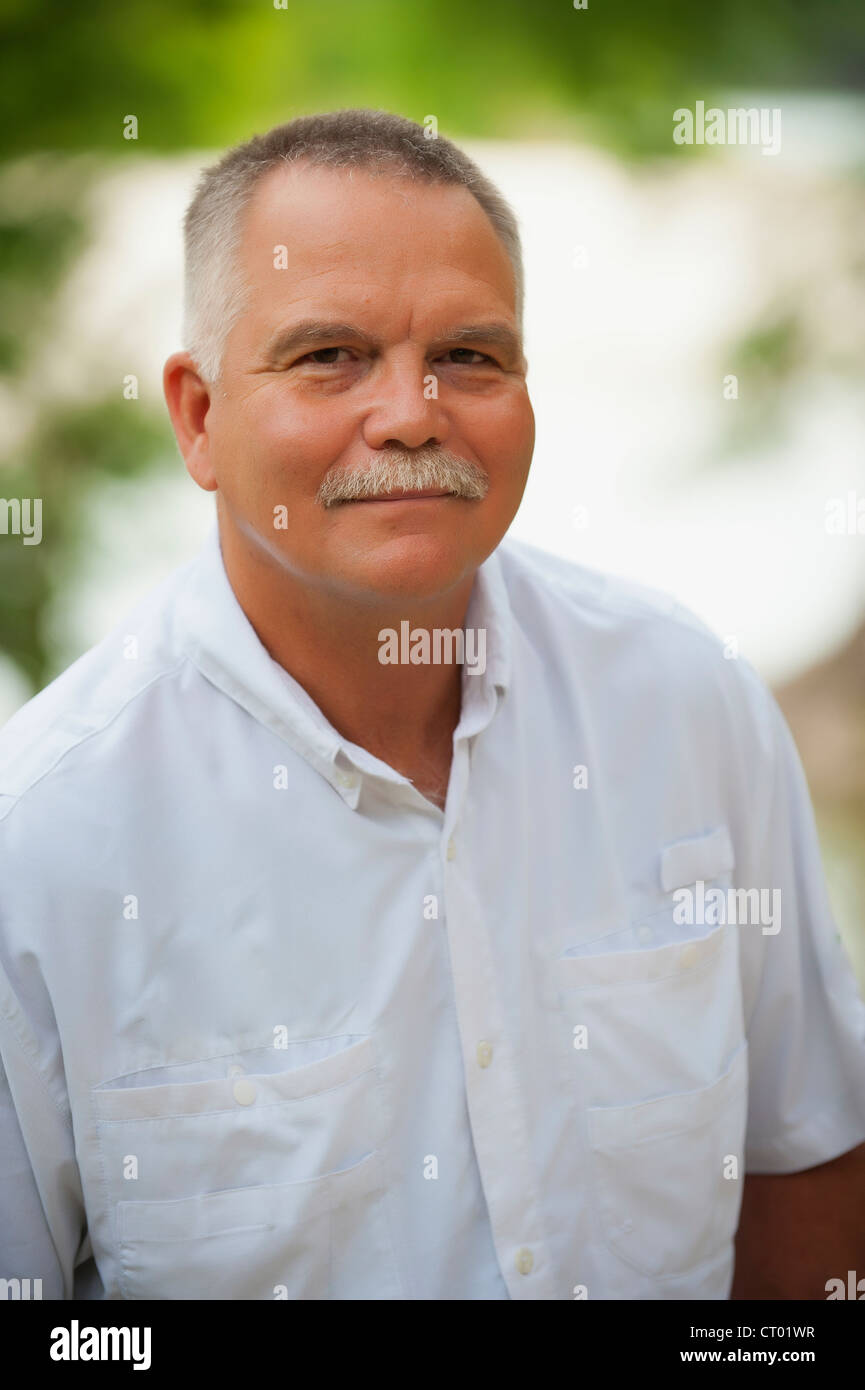 Outdoor portrait of an attractive older man Stock Photo - Alamy