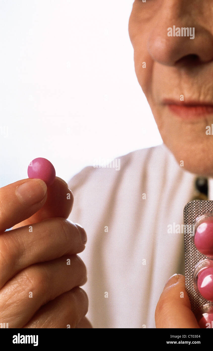 ELDERLY PERSON TAKING MEDICATION Stock Photo - Alamy