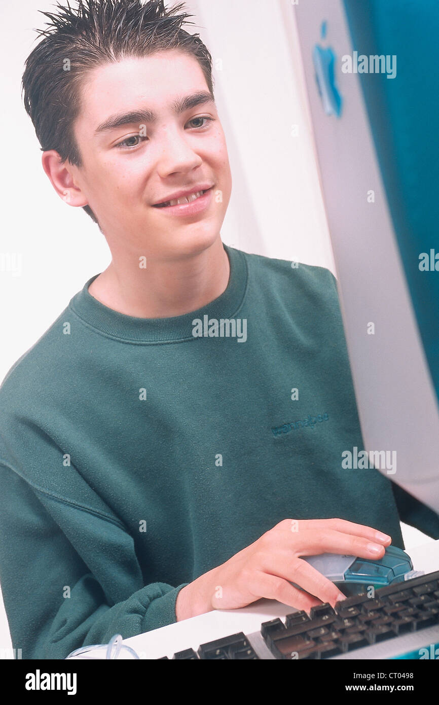 TEENAGER AT A COMPUTER Stock Photo - Alamy