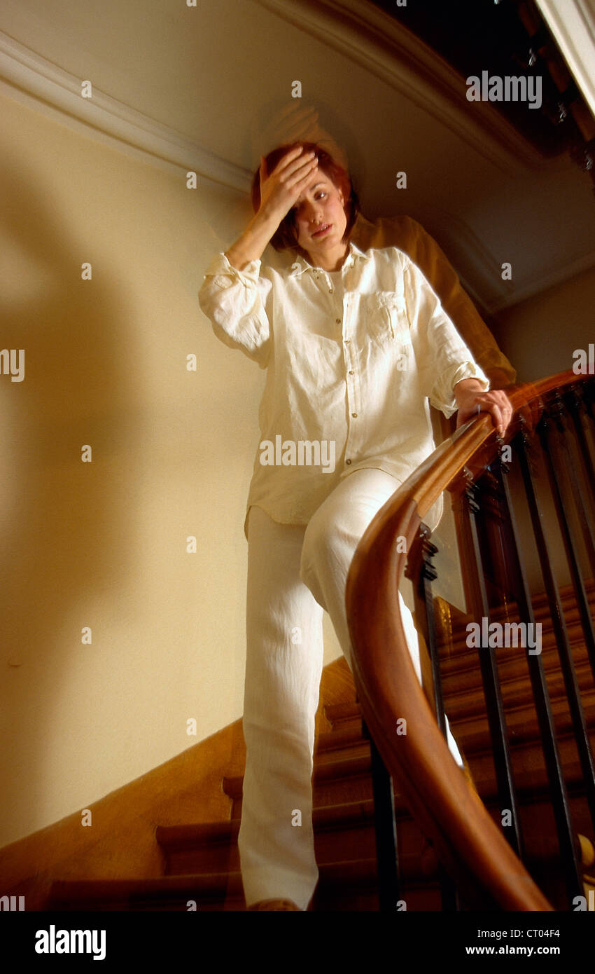 WOMAN WITH VERTIGO Stock Photo - Alamy