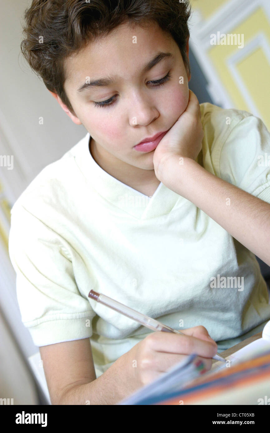 CHILD DOING HOMEWORK Stock Photo - Alamy
