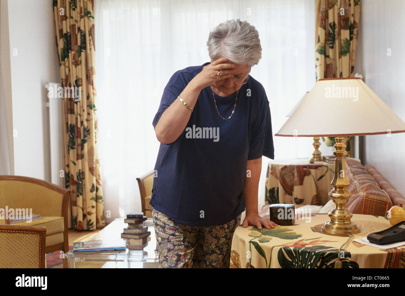 ELDERLY PERSON WITH VERTIGO Stock Photo - Alamy