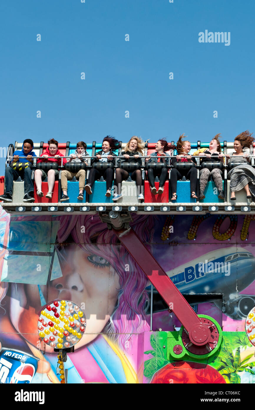 The 'Miami Trip' fairground ride in action Stock Photo - Alamy