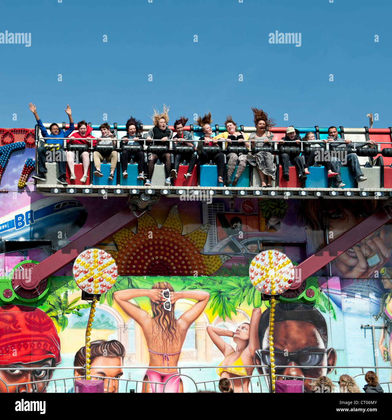 The 'Miami Trip' fairground ride in action Stock Photo - Alamy