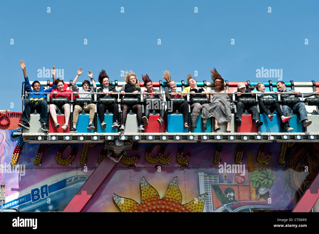 The 'Miami Trip' fairground ride in action Stock Photo - Alamy