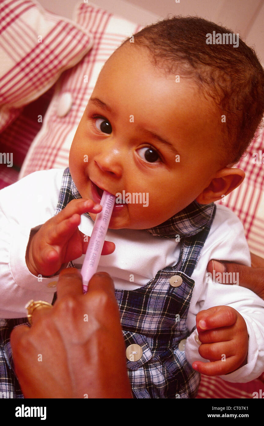 INFANT TAKING MEDICATION Stock Photo - Alamy
