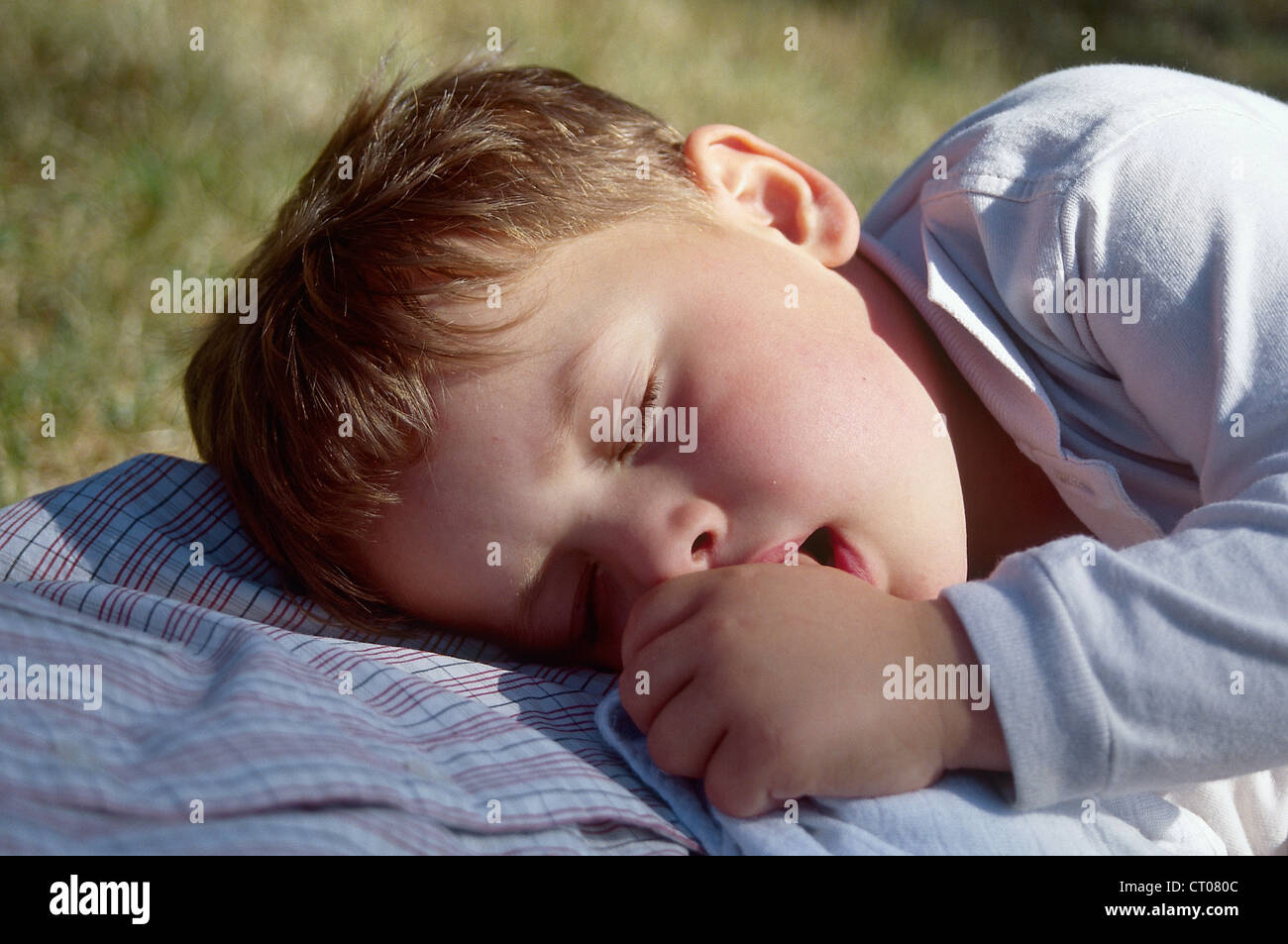 Children taking naps hi-res stock photography and images - Alamy