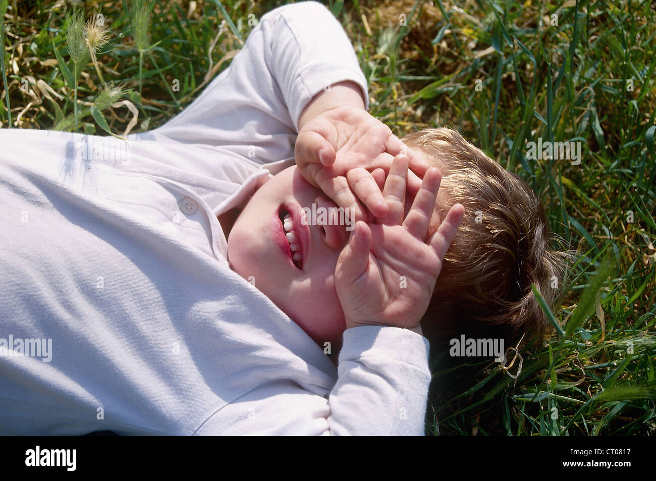 PHOTOPHOBIA IN A CHILD Stock Photo - Alamy