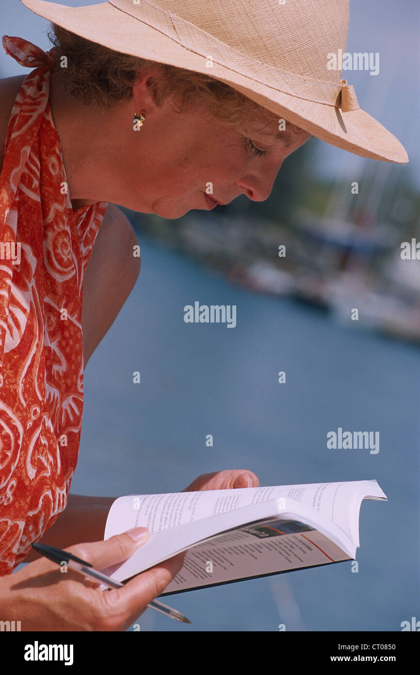 ELDERLY PERSON READING Stock Photo - Alamy