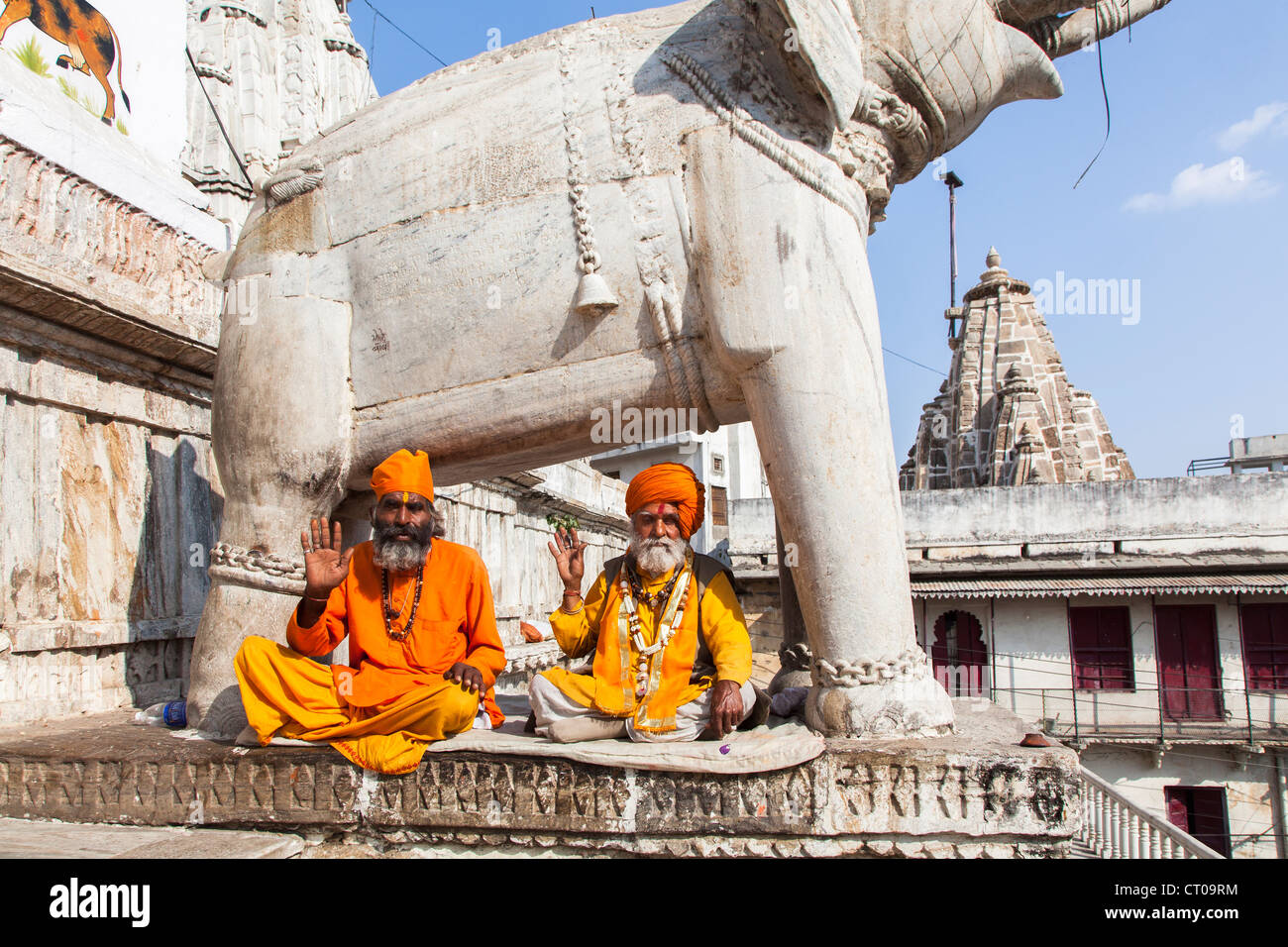 Sadhus, Indian Hindu holy men dressed in typical saffron robes beneath ...