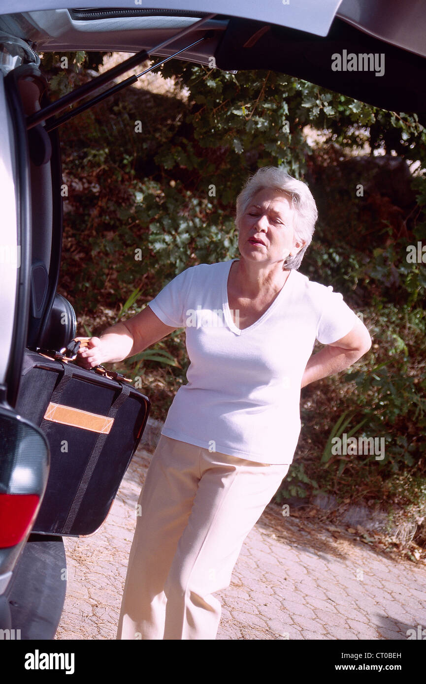 BACK PAIN IN AN ELDERLY PERSON Stock Photo - Alamy