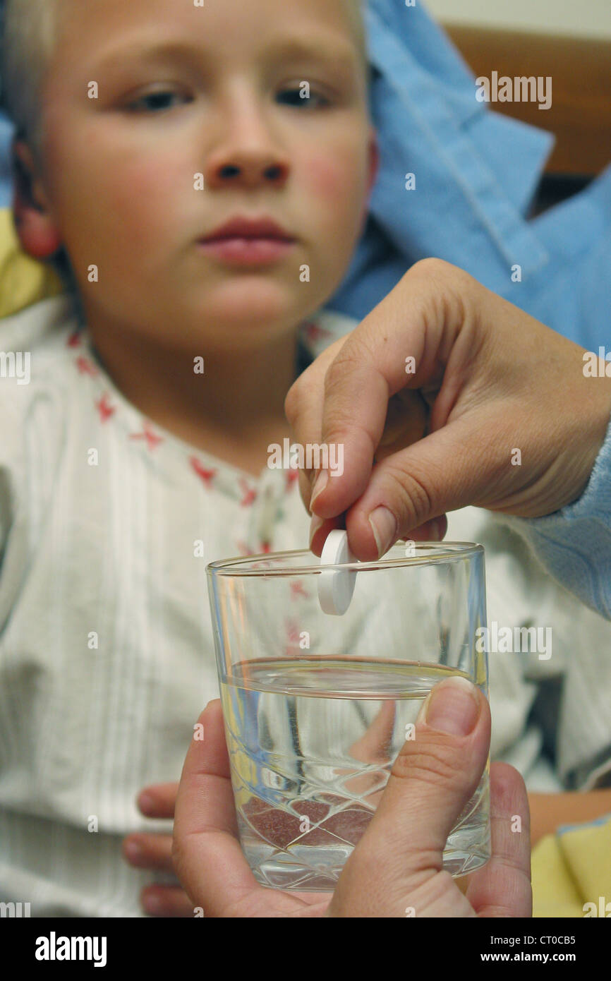 CHILD TAKING MEDICATION Stock Photo - Alamy