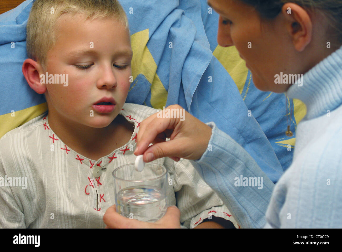 CHILD TAKING MEDICATION Stock Photo - Alamy