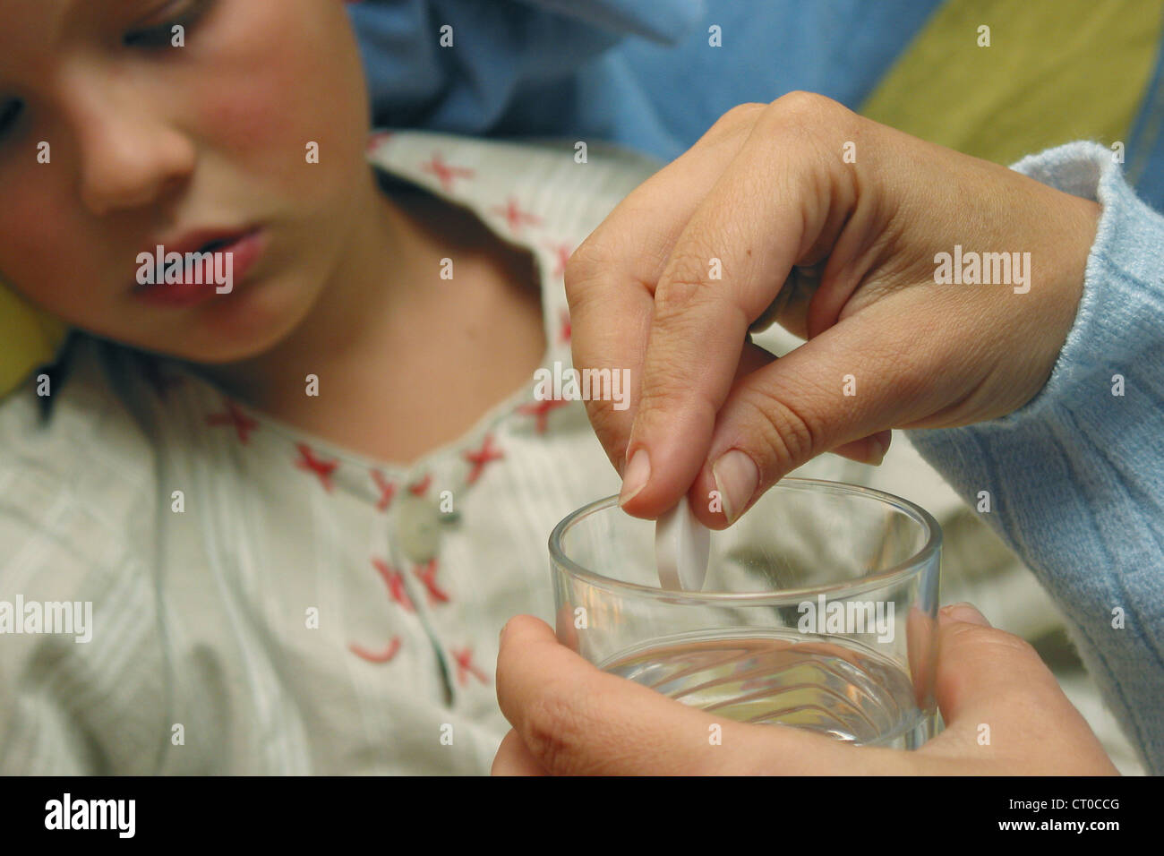 CHILD TAKING MEDICATION Stock Photo - Alamy