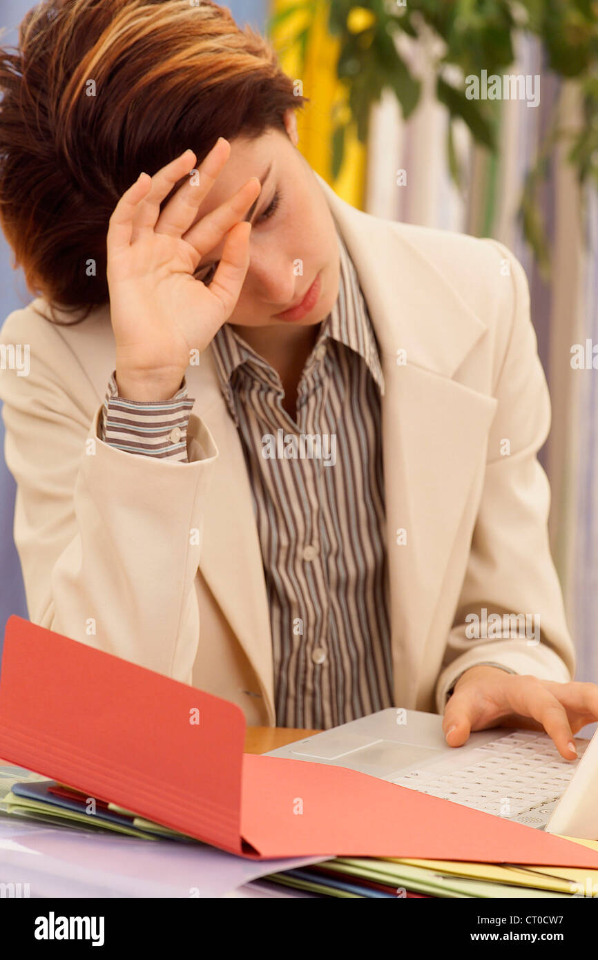 STRESSED WOMAN INDOORS Stock Photo - Alamy