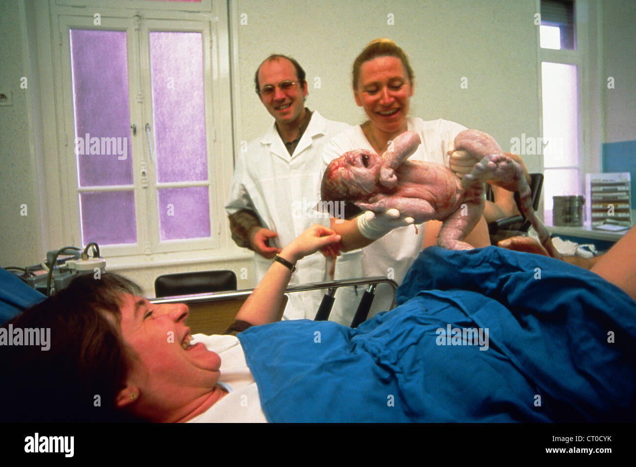 Newborn baby delivery room parents birth hospital hi-res stock ...