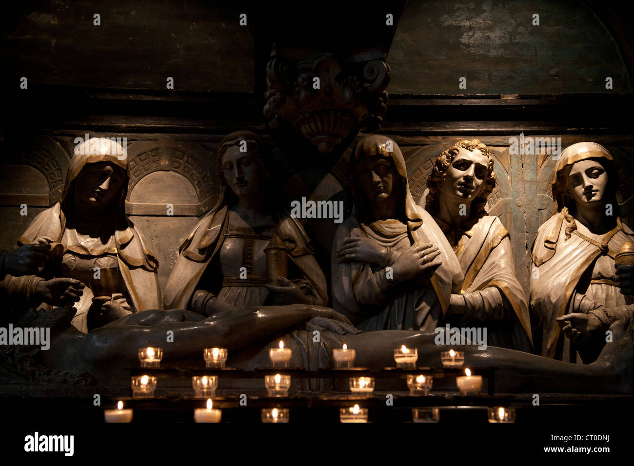 Statue of people mourning over the body of Jesus in the Saint Gudula in ...