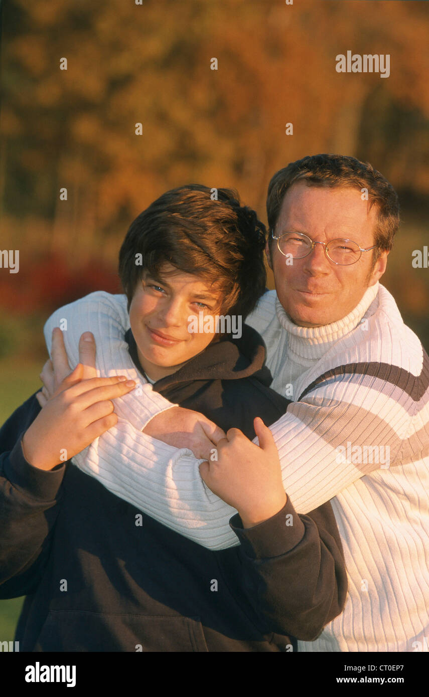 FATHER & ADOLESCENT Stock Photo - Alamy