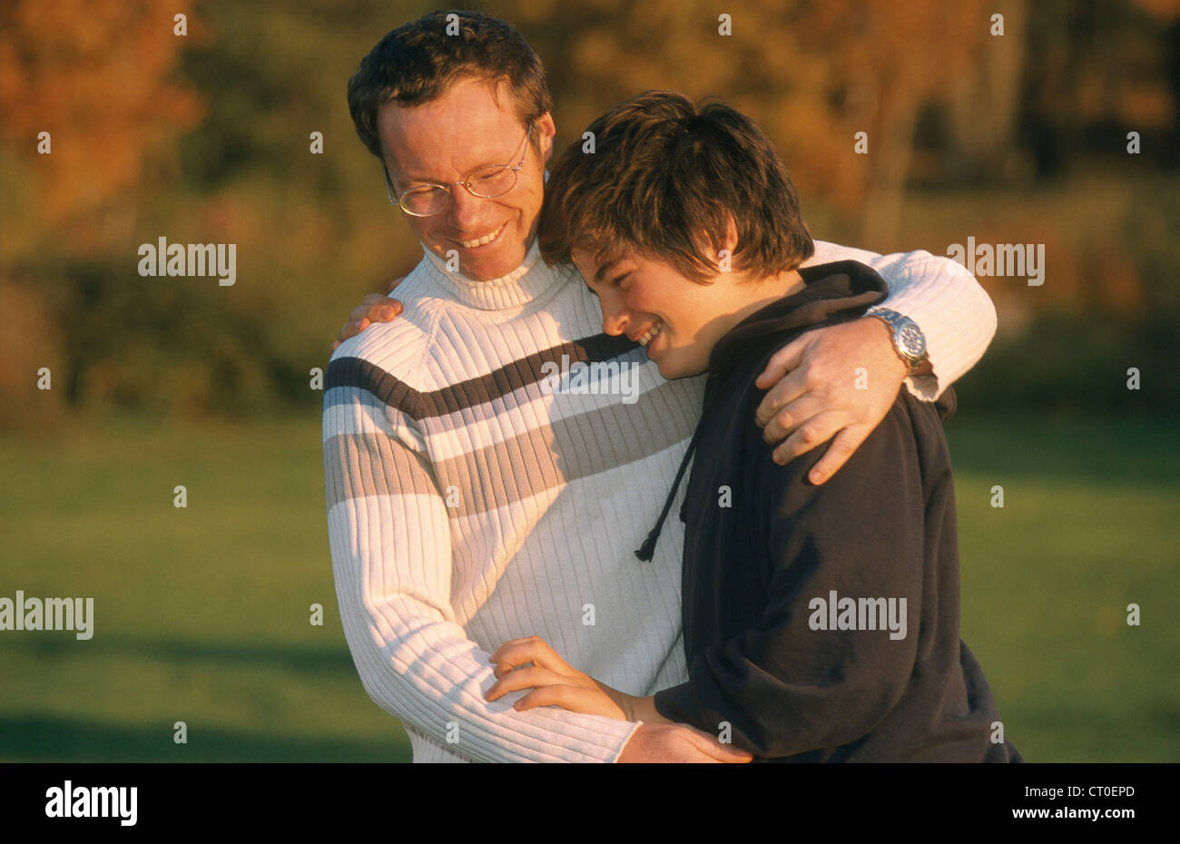 FATHER & ADOLESCENT Stock Photo - Alamy