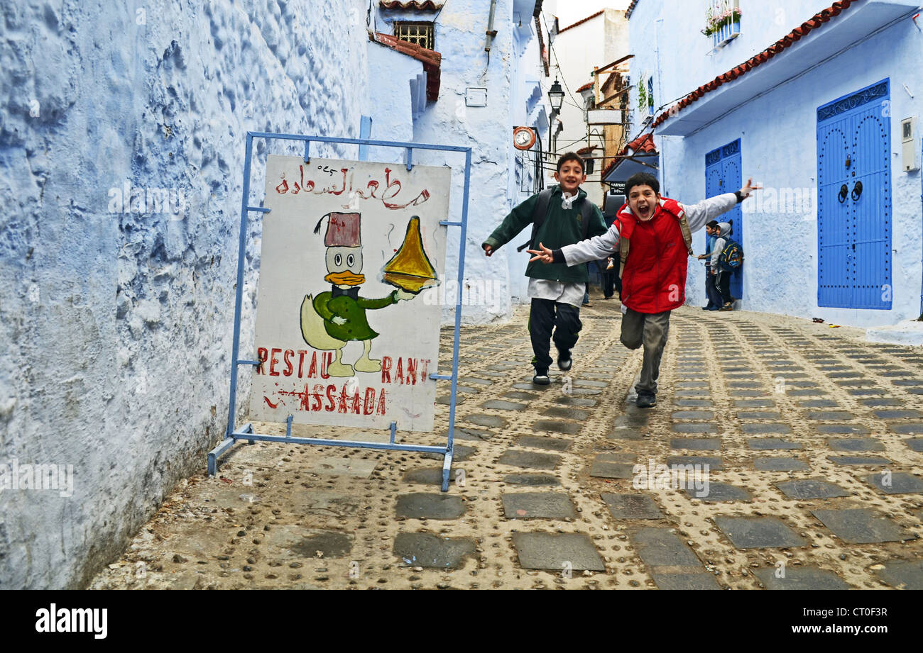 Boys blue medina chefchaouen hi-res stock photography and images - Alamy