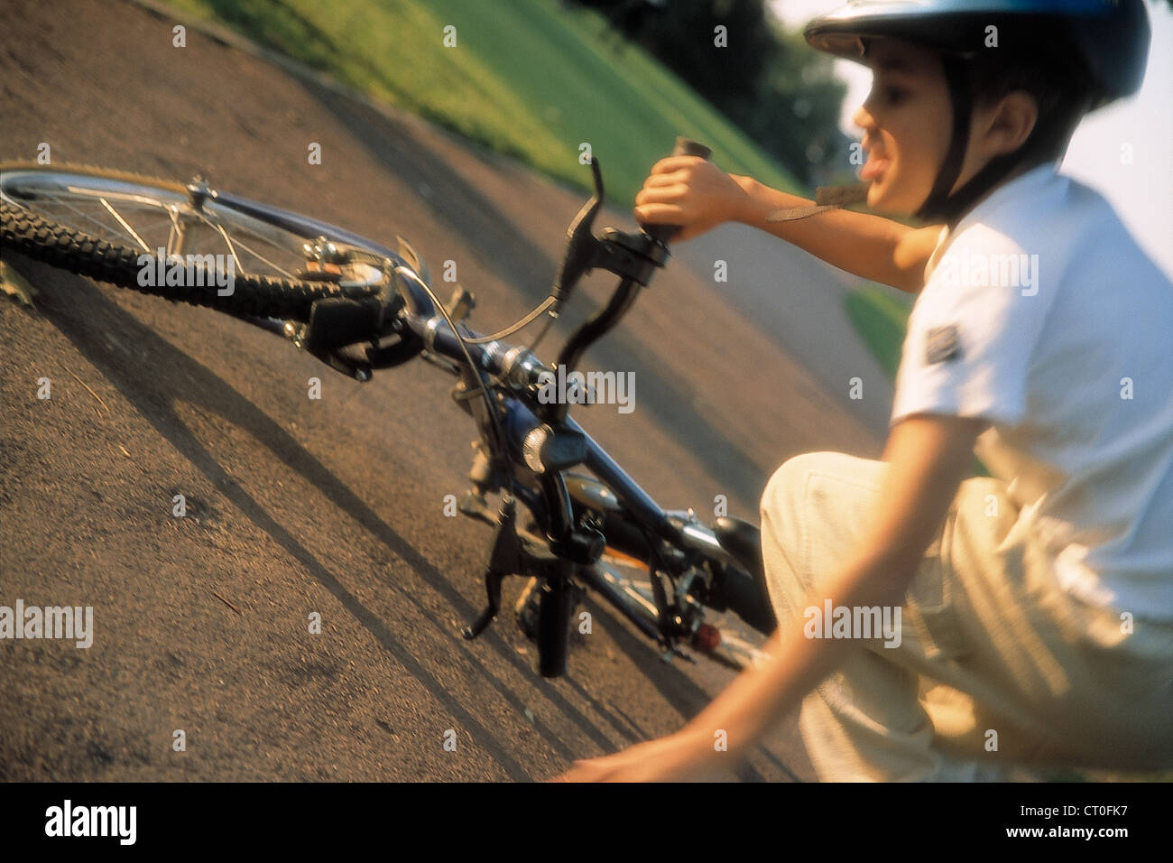 Child falling bicycle hi-res stock photography and images - Alamy