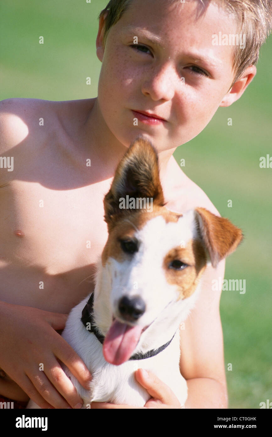 CHILD WITH ANIMAL Stock Photo - Alamy