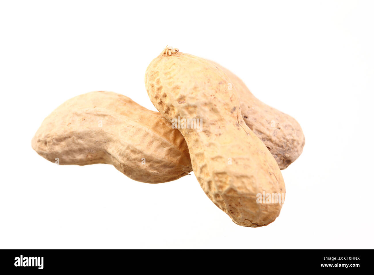 Peanuts nature food isolated on white background Stock Photo - Alamy