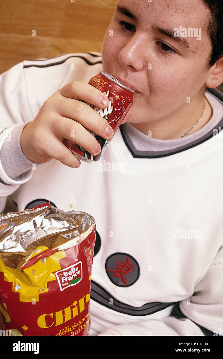 AN ADOLESCENT EATING Stock Photo - Alamy