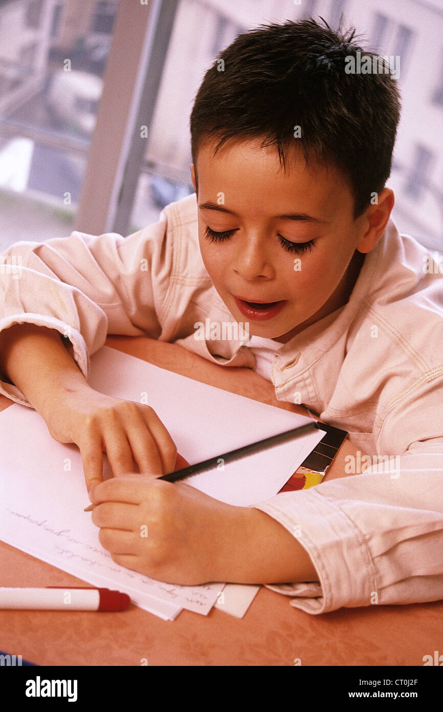 CHILD DOING HOMEWORK Stock Photo - Alamy