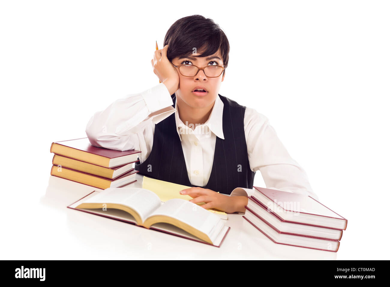 Bored Mixed Race Female Student at Desk with Books Isolated on a White ...