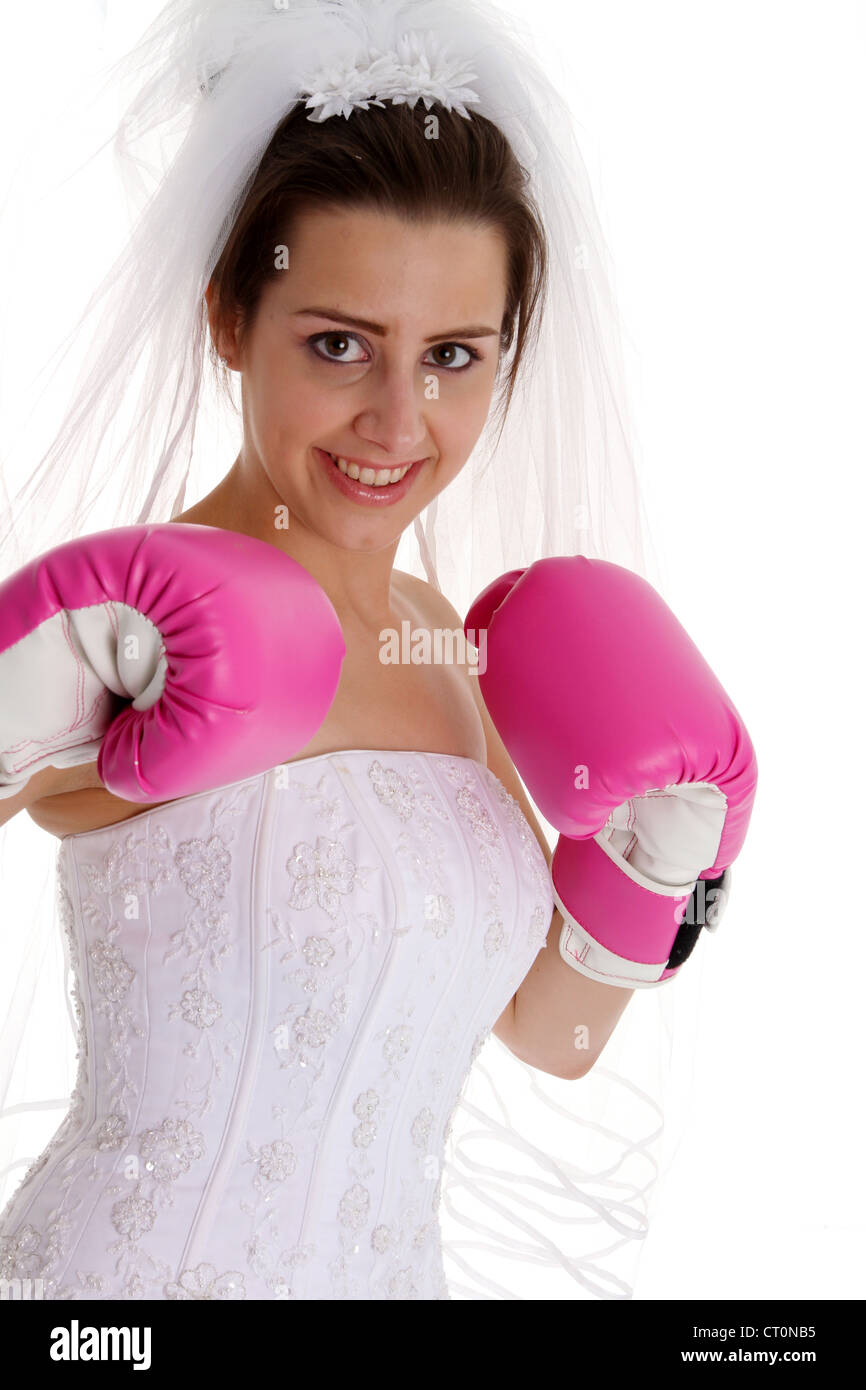 Woman in a wedding dress with boxing gloves Stock Photo - Alamy