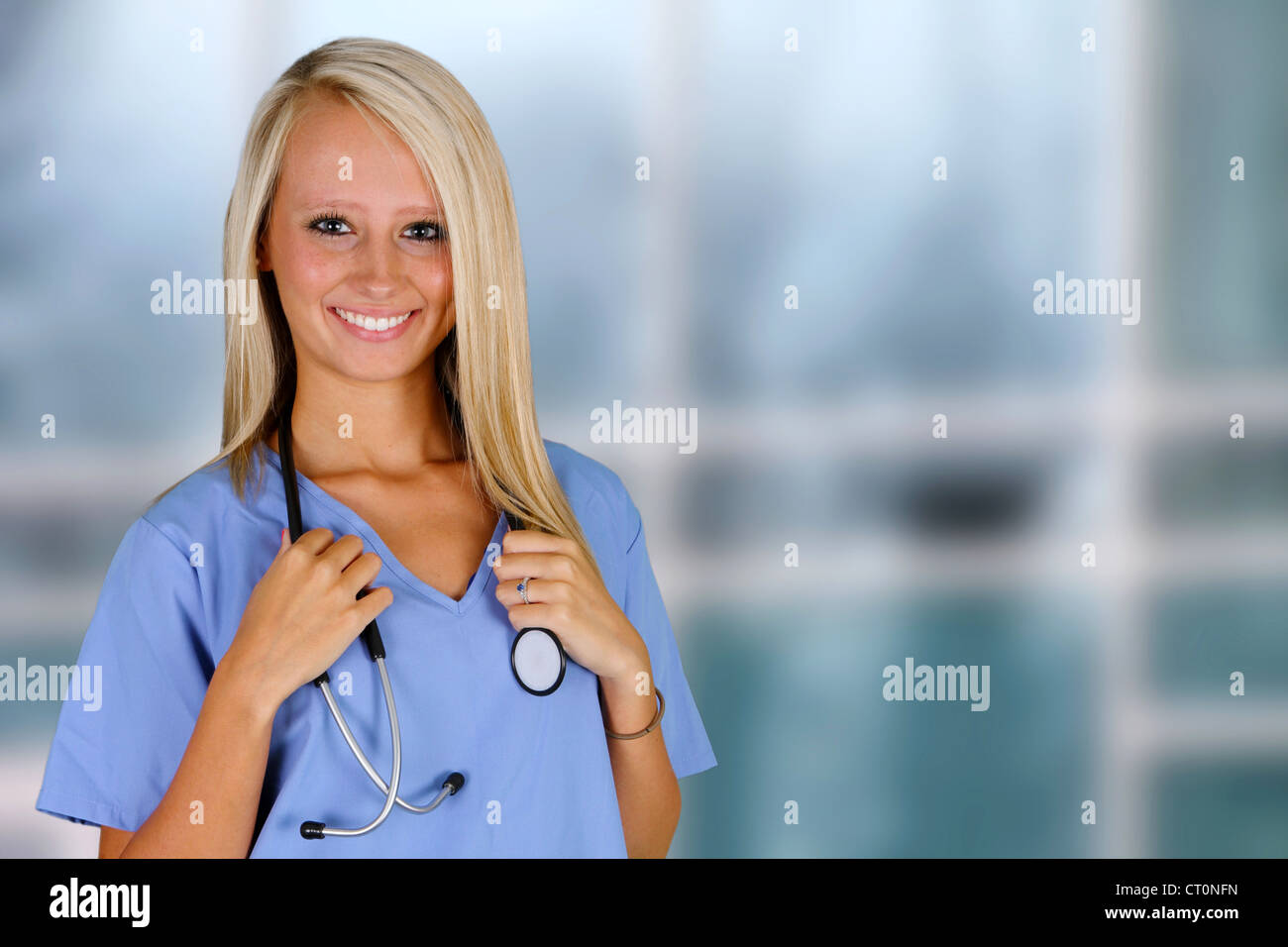 Young female nurse working in a hospital Stock Photo - Alamy