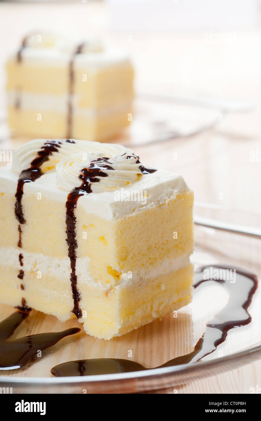 fresh cream cake closeup with chocolate sauce topping Stock Photo - Alamy