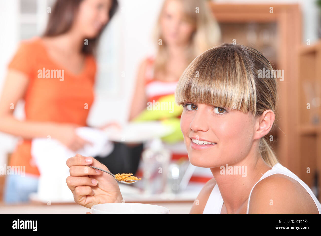 Friends eating breakfast Stock Photo - Alamy